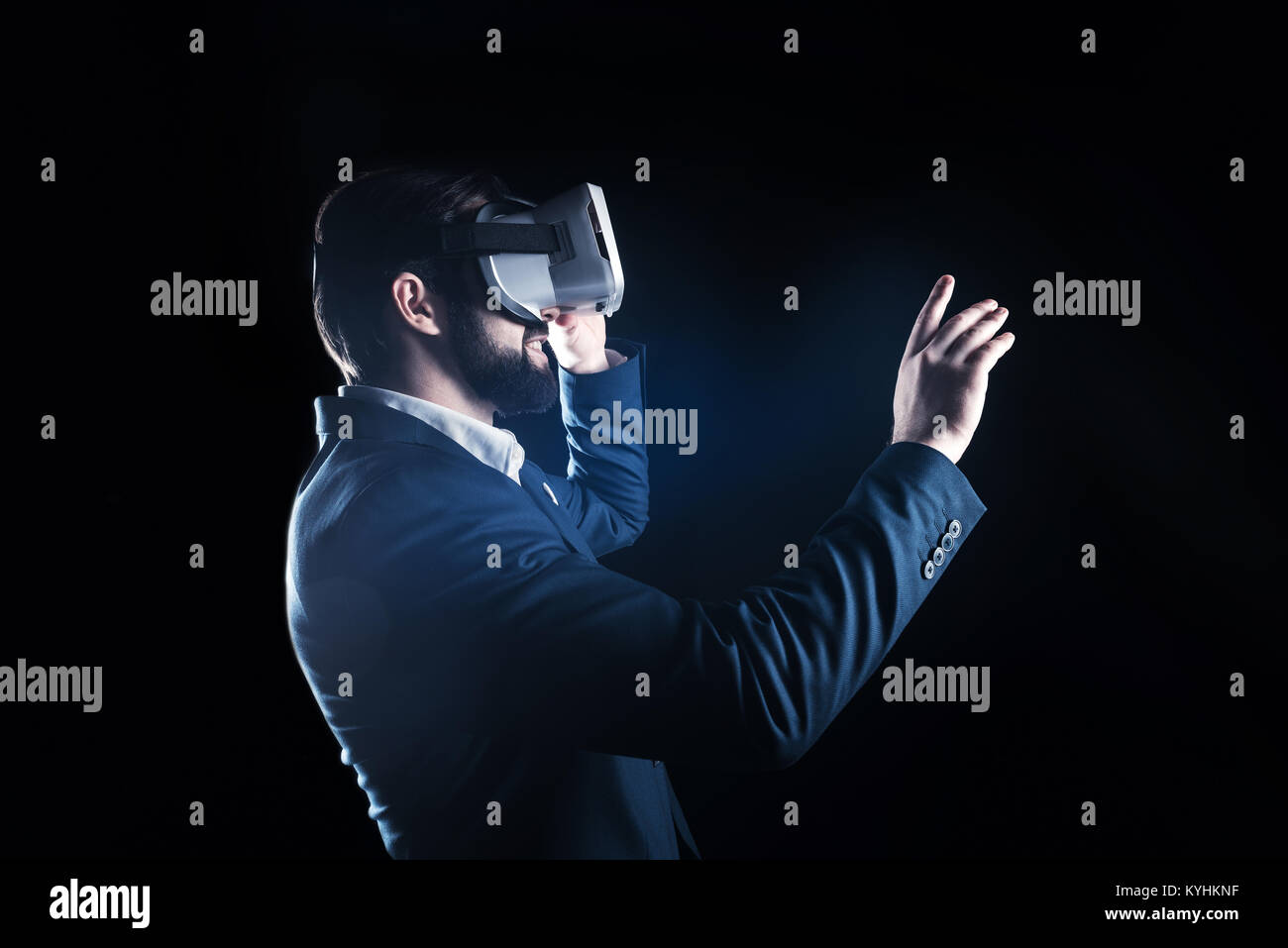 Happy positive man enjoying being in virtual reality Stock Photo - Alamy