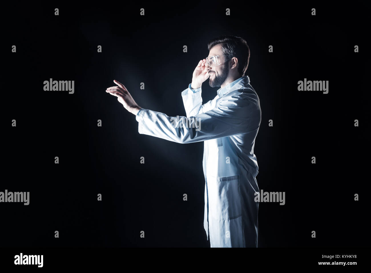 Happy delighted man standing in his lab Stock Photo - Alamy