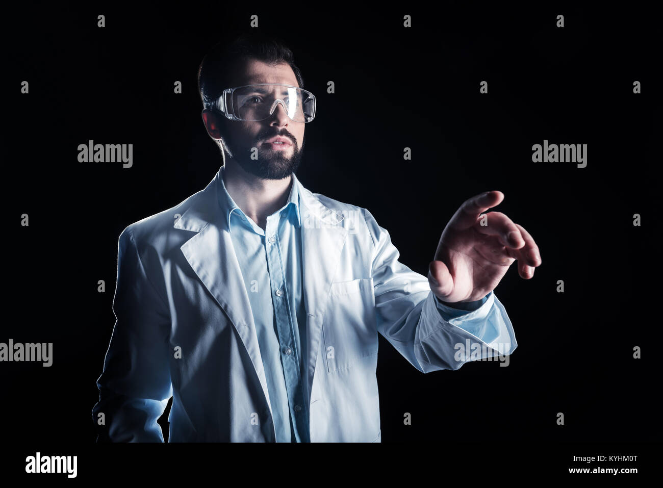Smart nice man working in the science lab Stock Photo - Alamy