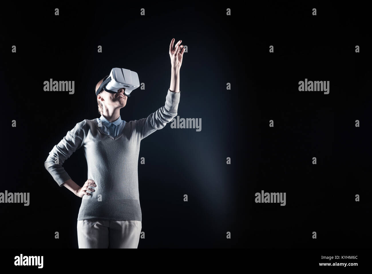 Happy nice woman looking up Stock Photo - Alamy