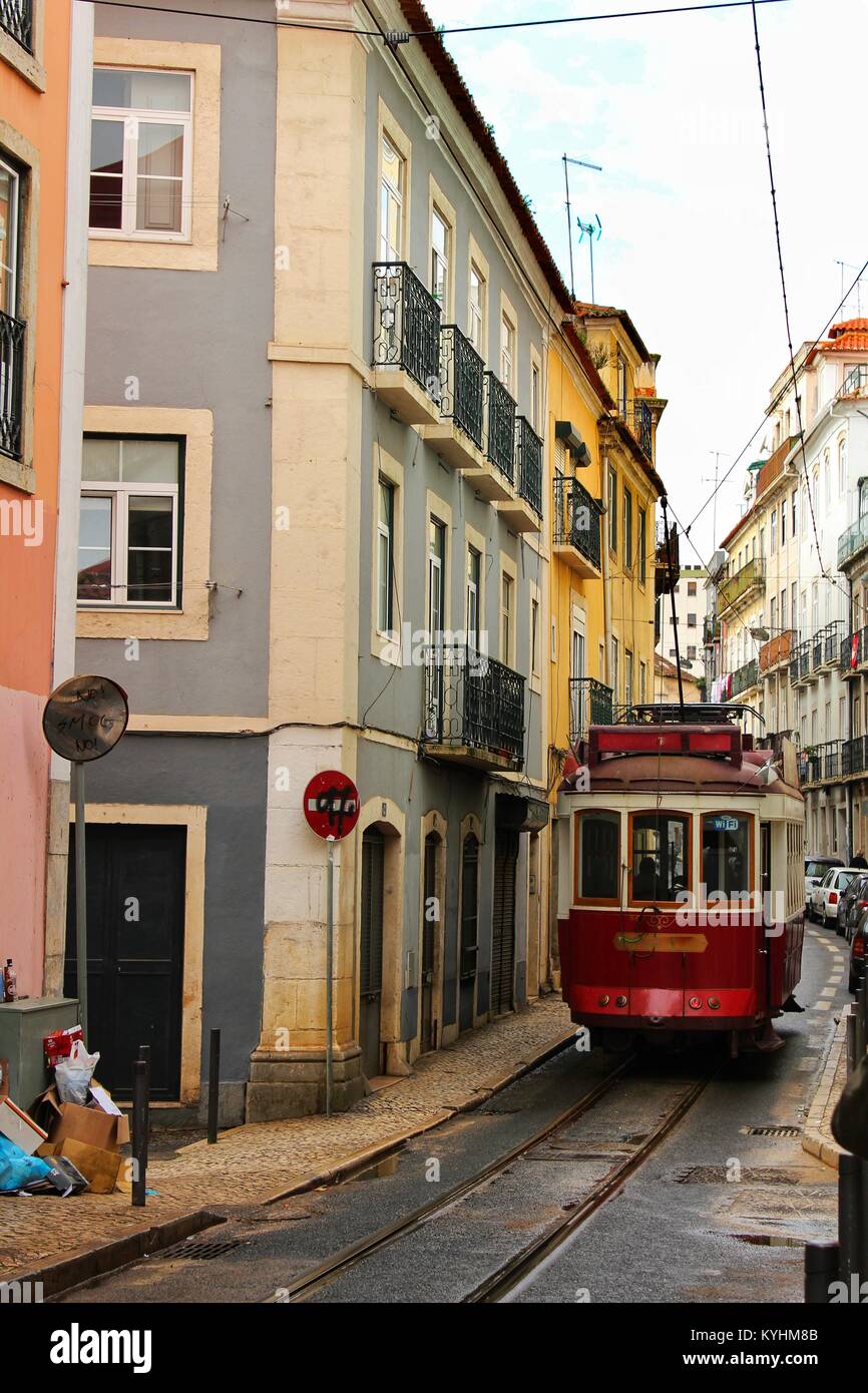 Colorful trams through the streets of Lisbon in Autumn Stock Photo - Alamy