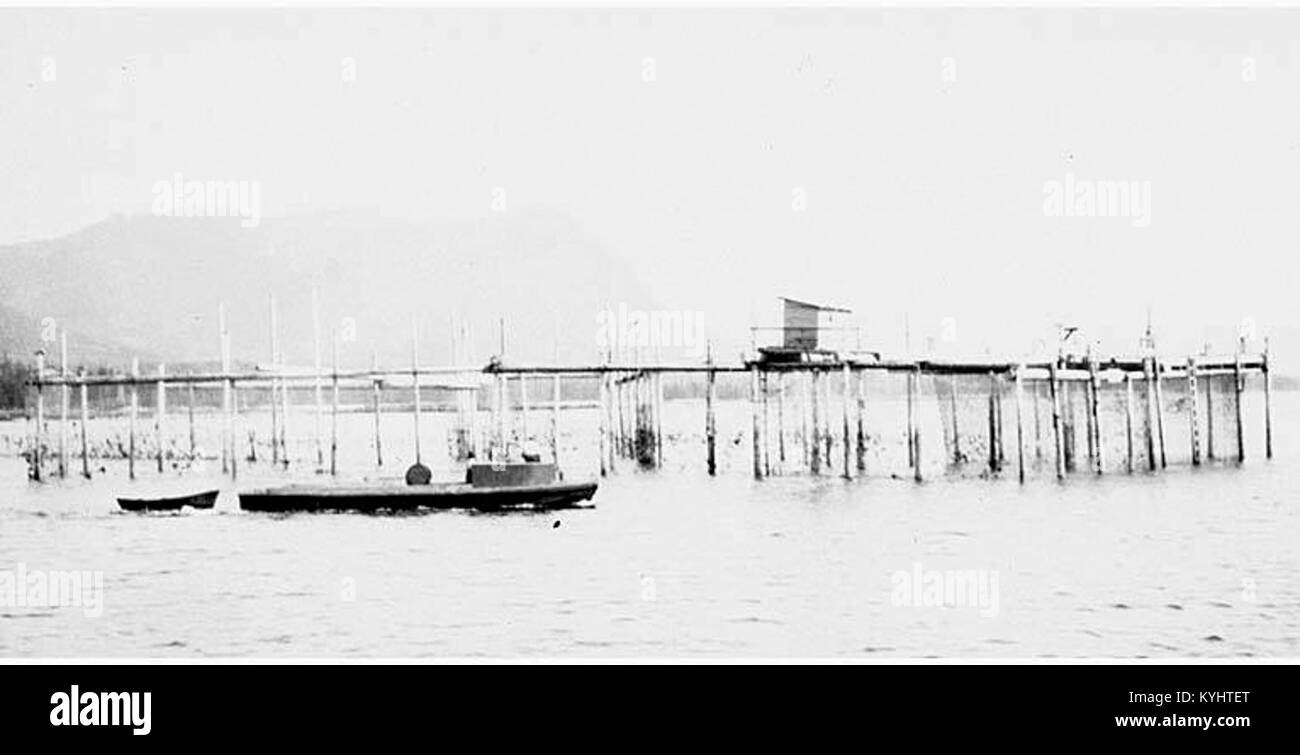 This historical image shows a salmon trap in Ketchikan, Alaska, around ...