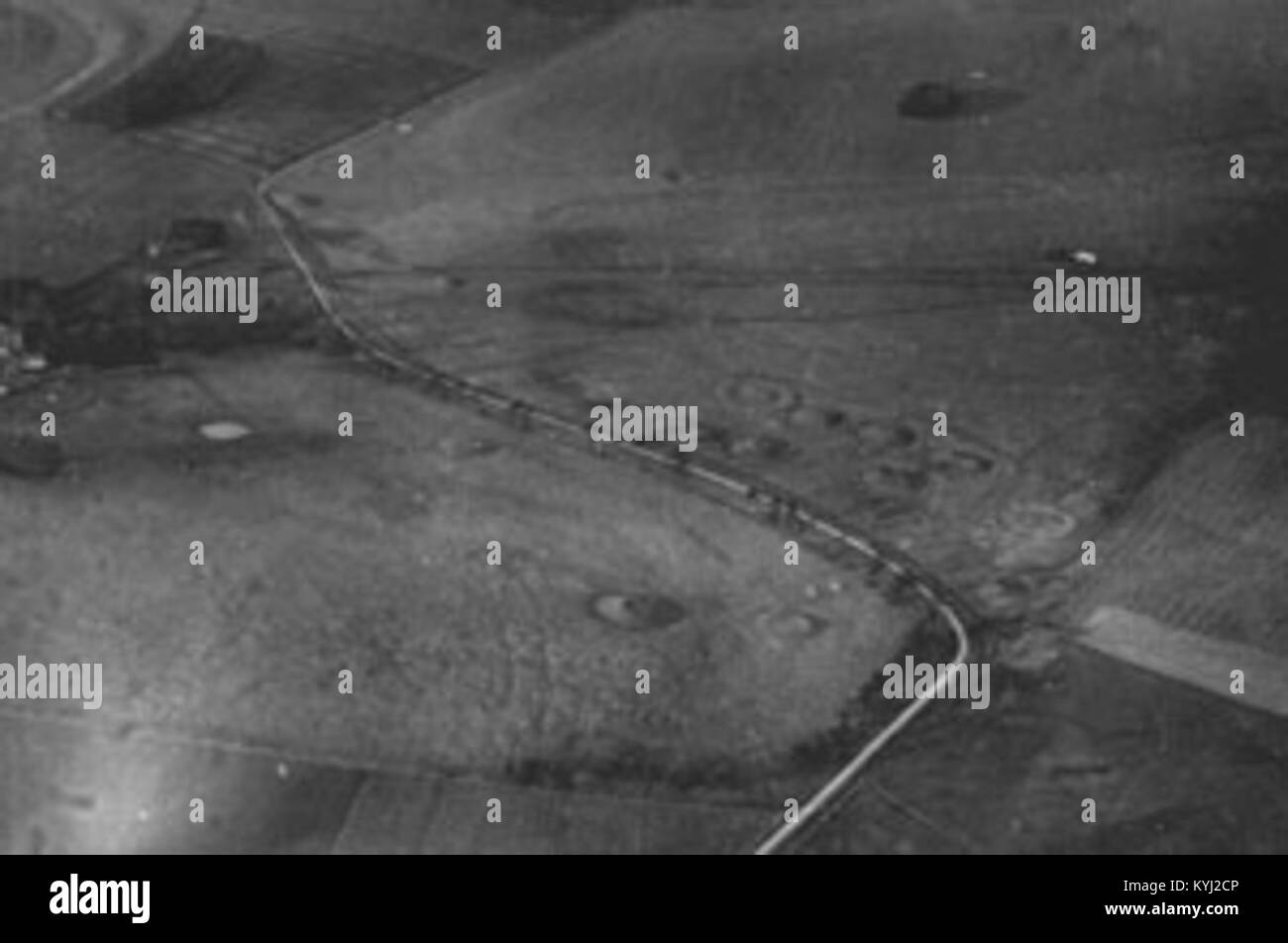 The aerial photograph of Seven Barrows, taken in 1933, shows the ...