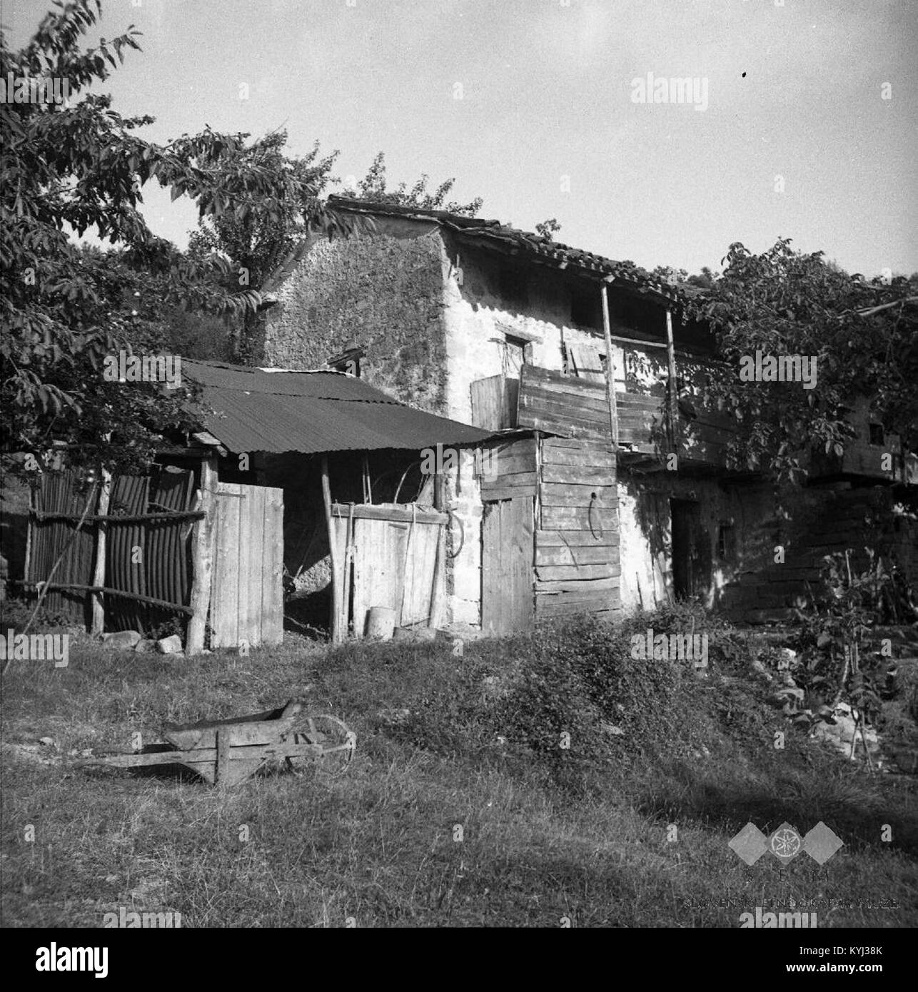 A photograph from 1953 showing a humble, traditional dwelling in Senik ...