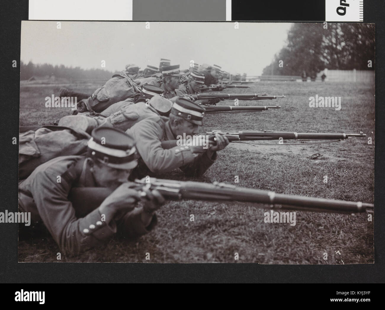 This photograph shows soldiers on a shooting range, likely taken as ...