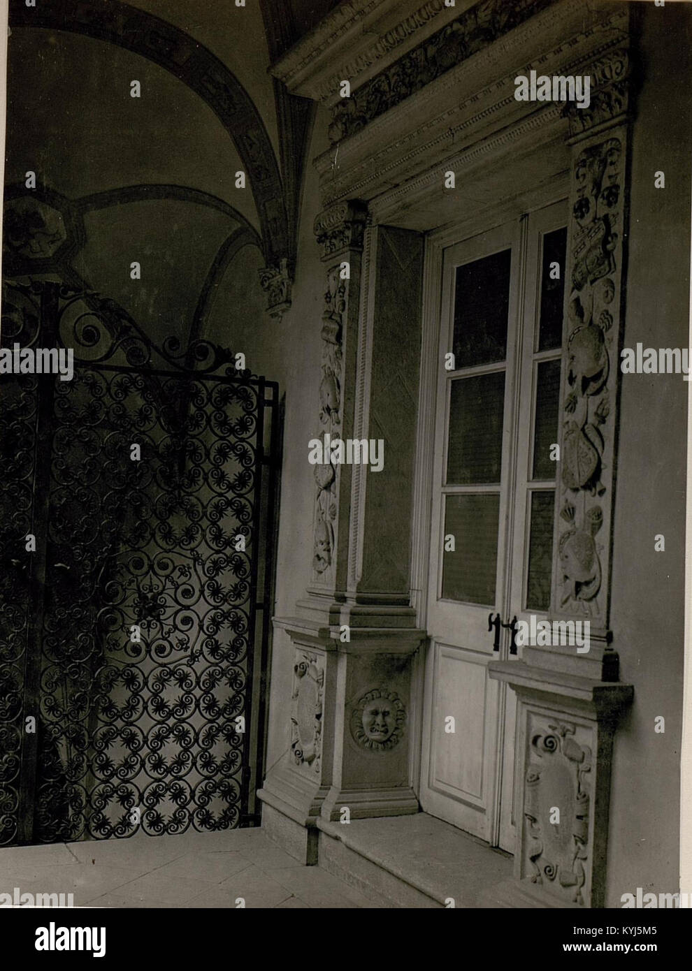 This photograph shows the gate and first-floor door of Schloss Porcia ...