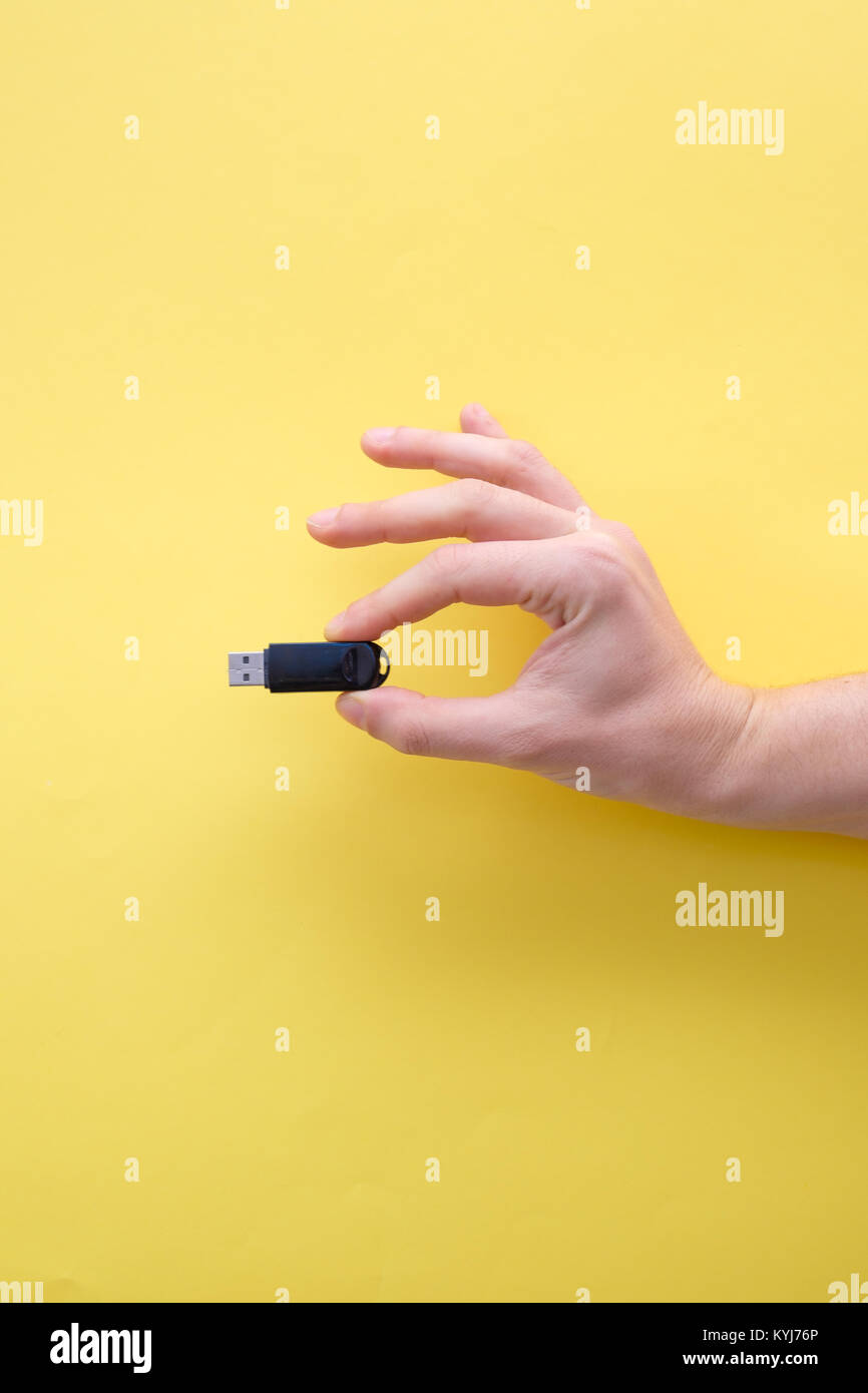 Hand holding usb memory flash drive Stock Photo - Alamy