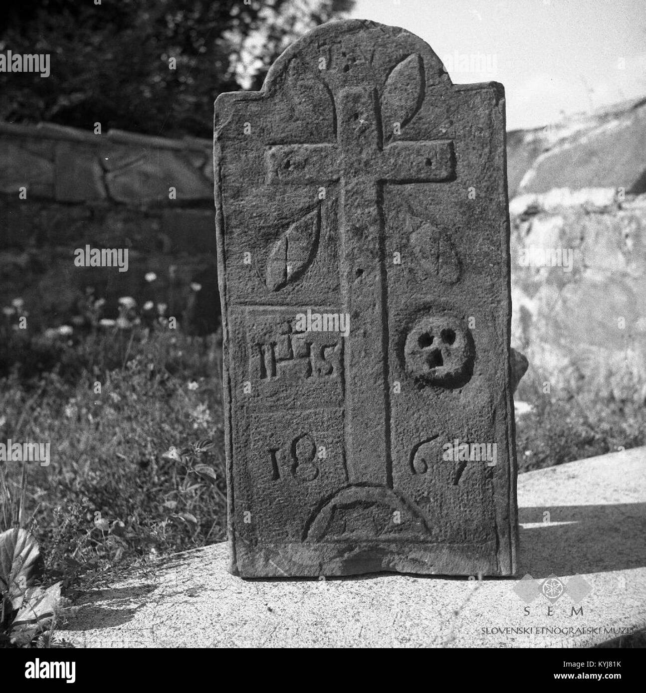 A historical tombstone from 1953 at a cemetery in Fojana, located near ...