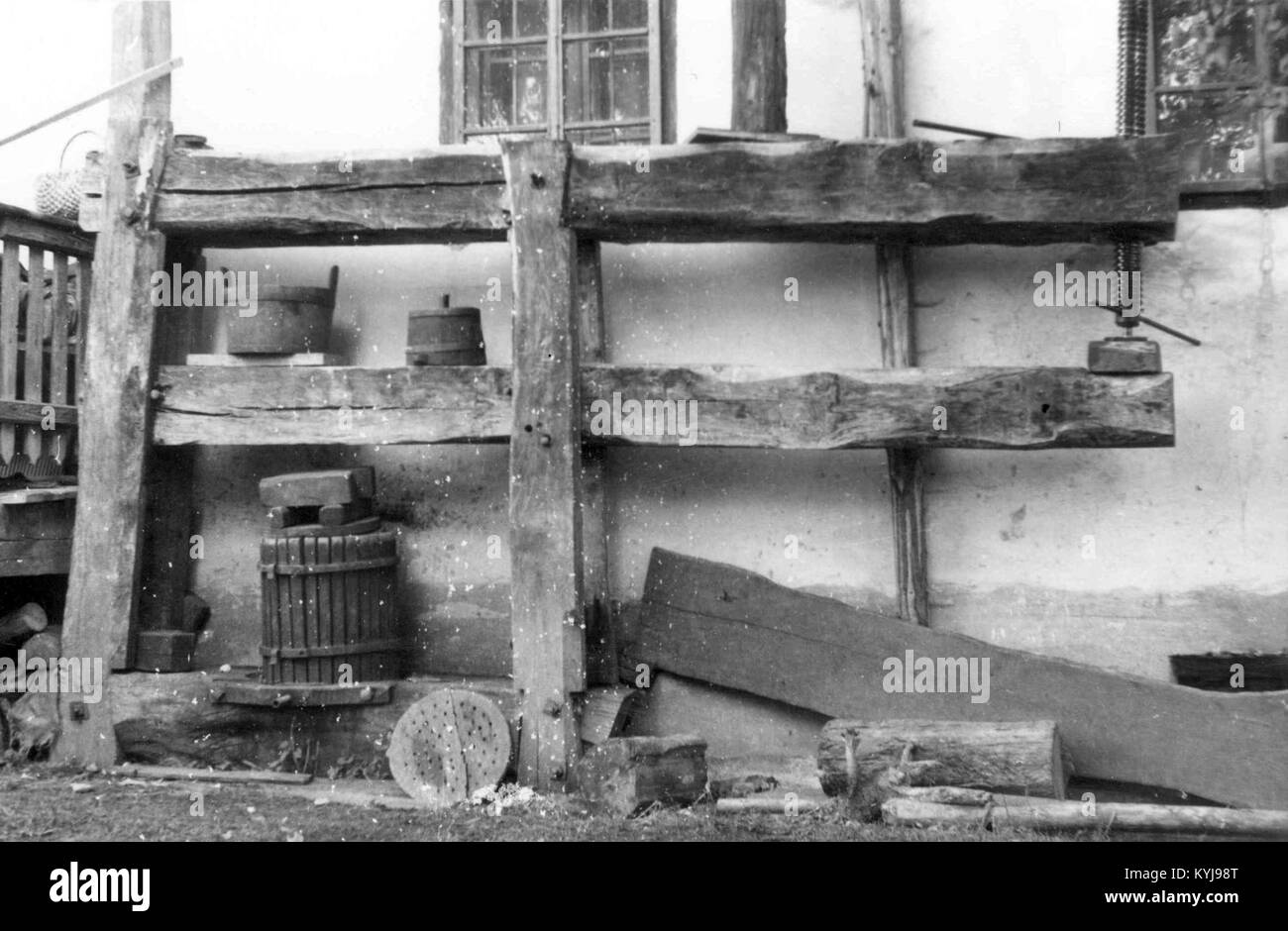 A 1951 photograph from Poklanče showing a traditional wooden press used ...