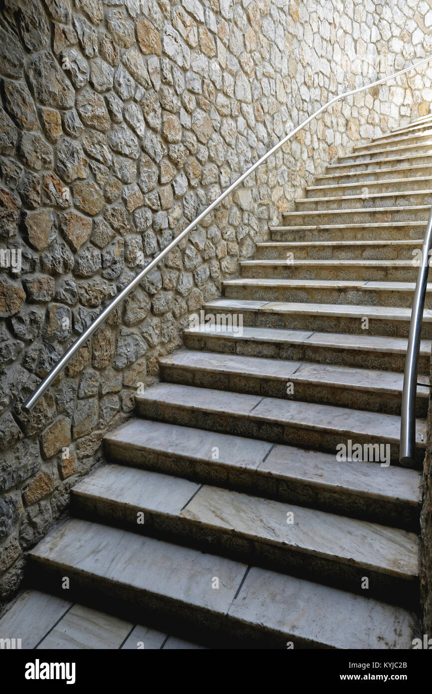 Flight of Stairs With Banister at Stone Wall Stock Photo - Alamy