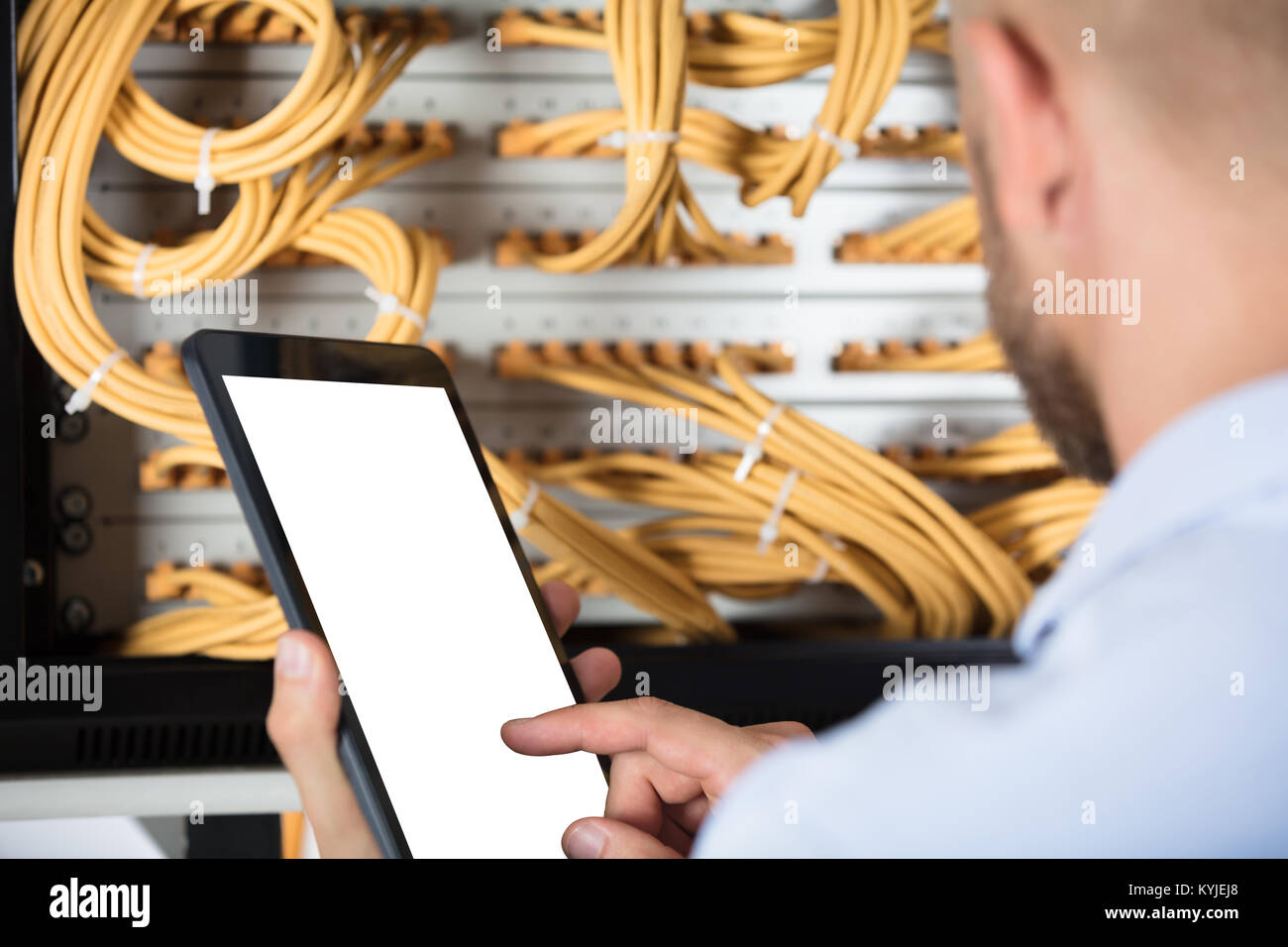 Male technician working in data hi-res stock photography and images - Alamy