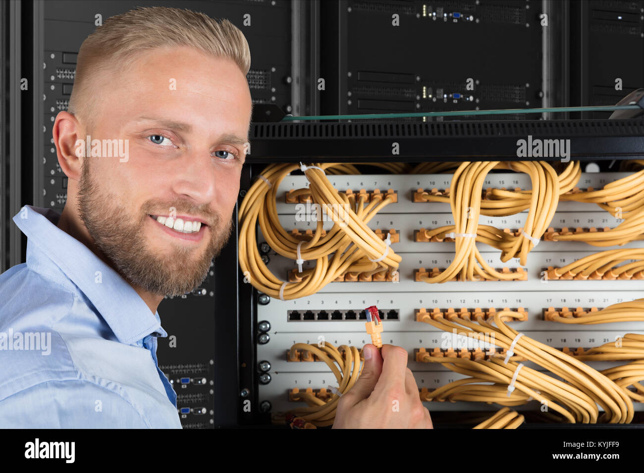 Man holding computer cables hi-res stock photography and images - Alamy