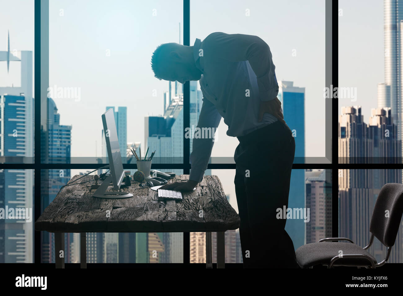Young Businessman Suffering From Backpain In Modern Office Stock Photo ...