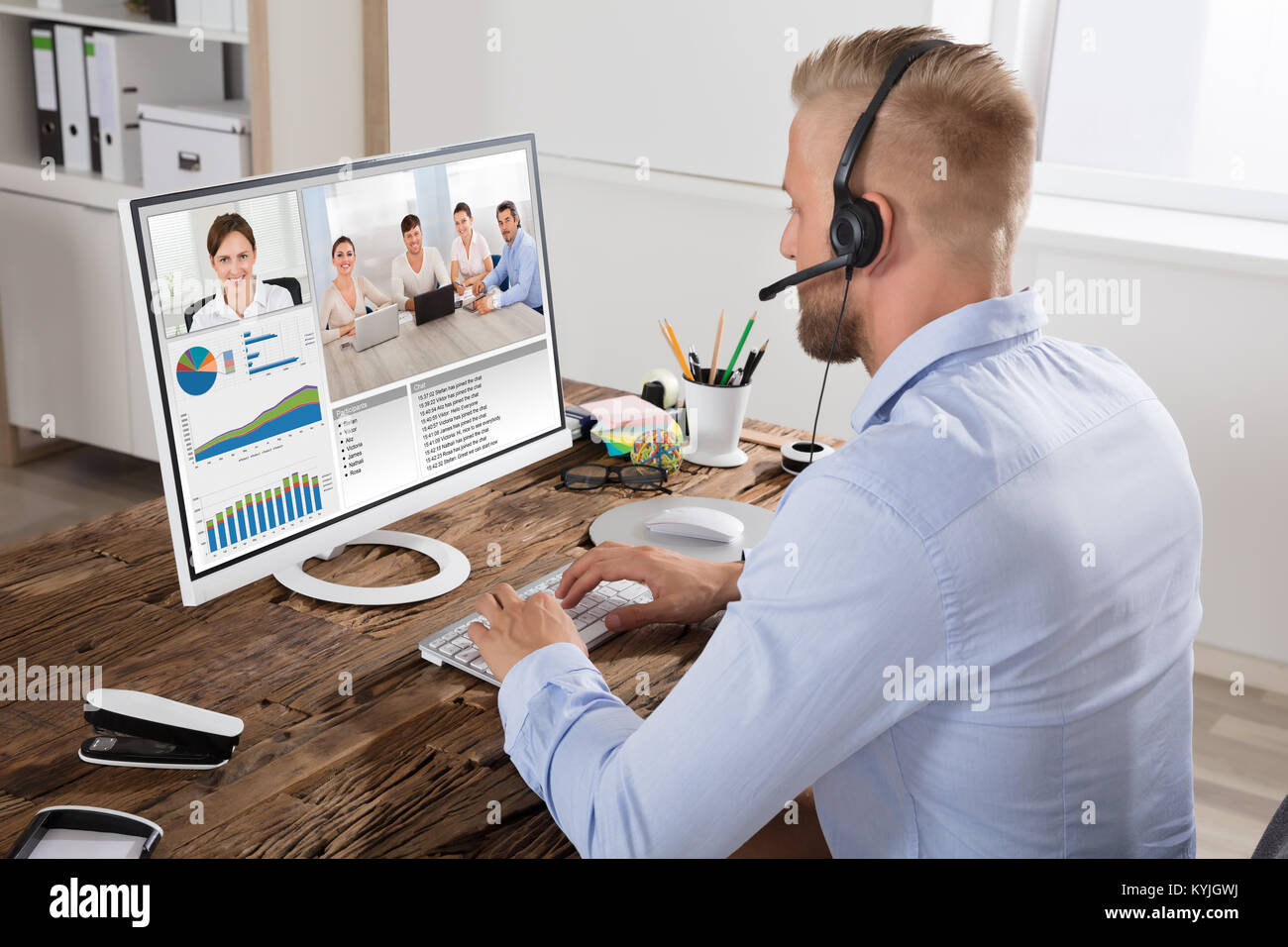 Smart Businessman Video Conferencing With Team On Computer At Workplace ...