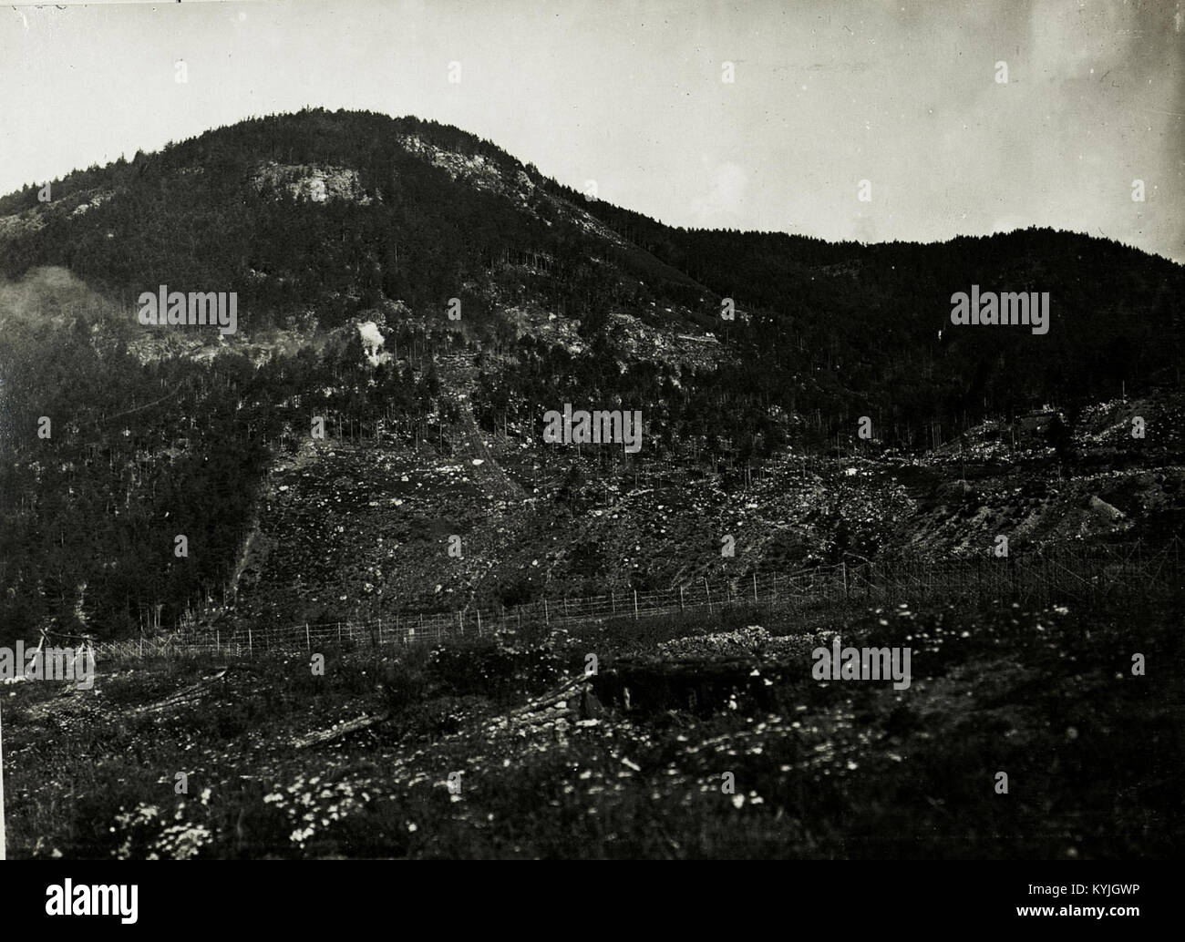 A historical photograph showing a military assault course exercise in ...