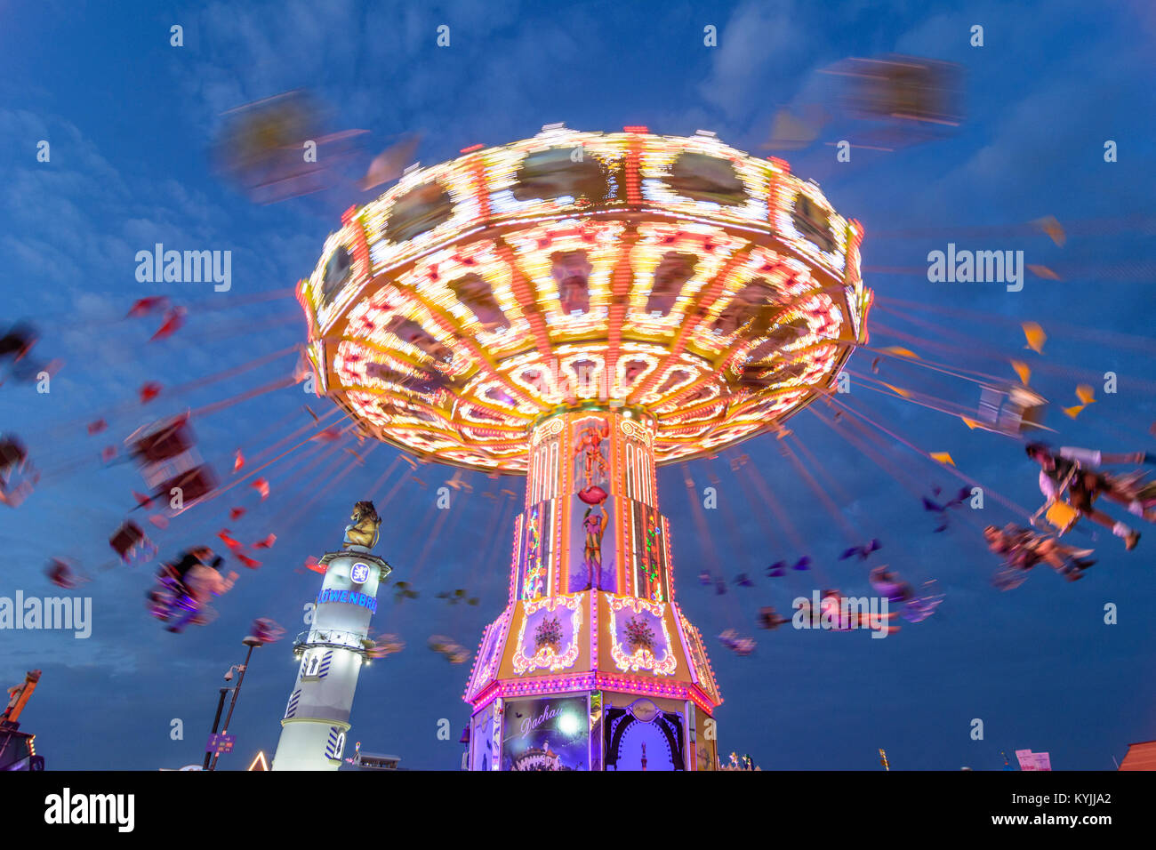 München, Munich: Oktoberfest beer festival: carousel, people ...