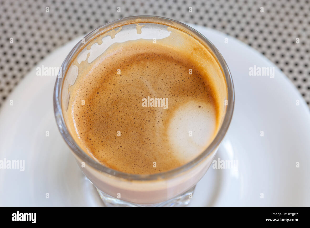 Close up top view cortado coffee froth Stock Photo - Alamy