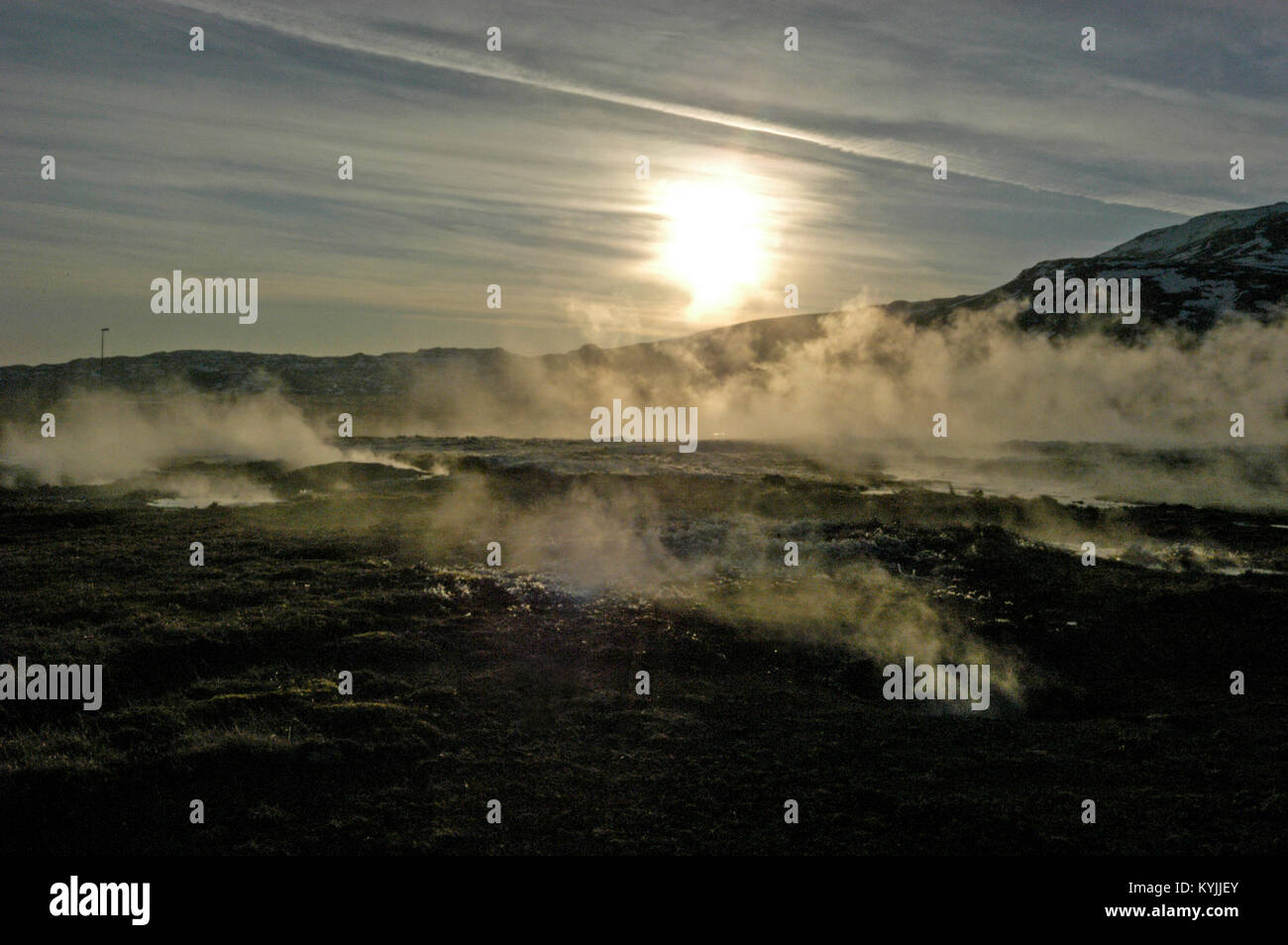 Continuous hot steam drifts from smaller hot springs close to the ...