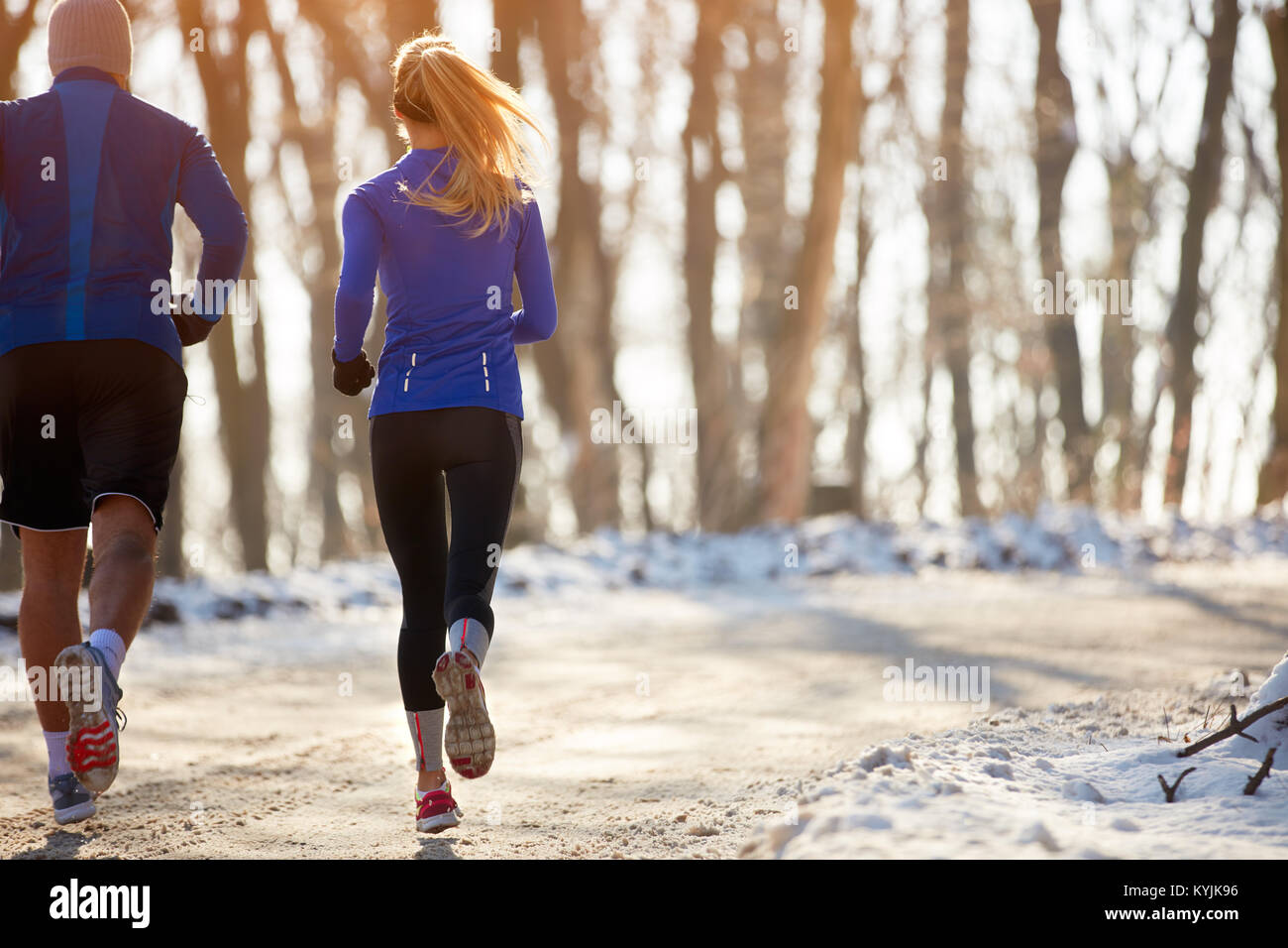 Back view of young athlete while running outdoor Stock Photo - Alamy