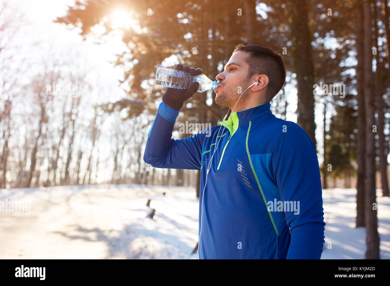 Man running after snow hi-res stock photography and images - Alamy