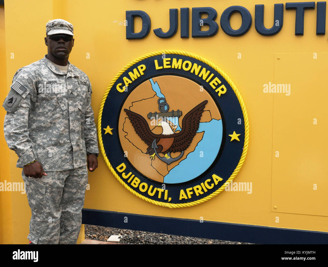 De’Marcus Hopson poses for a picture after graduating from Warrior ...