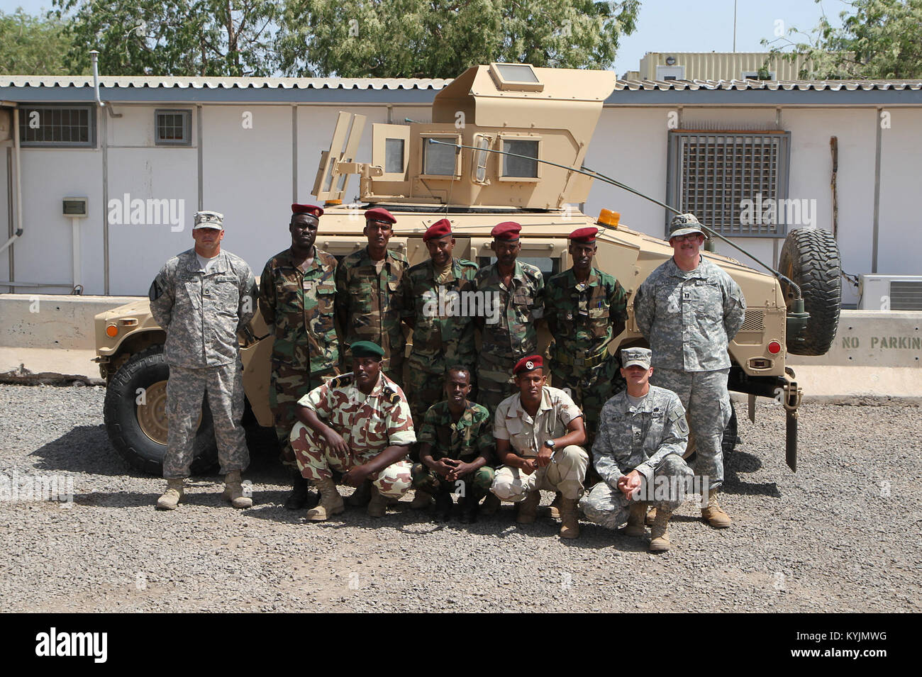 Soldiers of the 2nd Battalion, 138th Field Artillery gather with fellow ...
