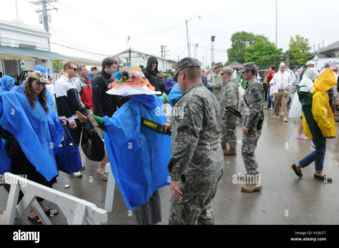 Soldiers of the 198th Military Police Battalion search spectators prior ...