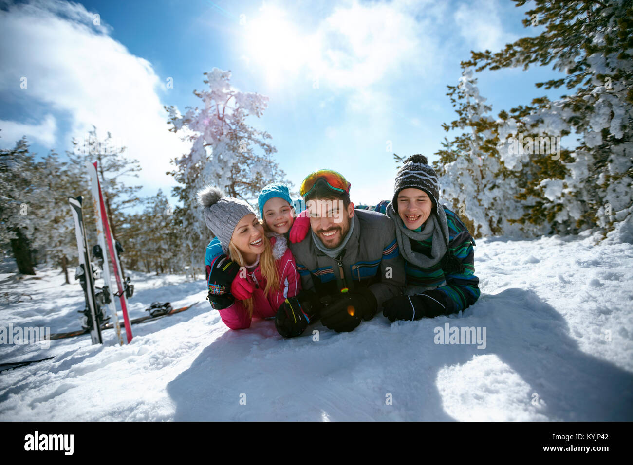 Ski, winter, snow, sun and fun – happy family enjoying in winter ...