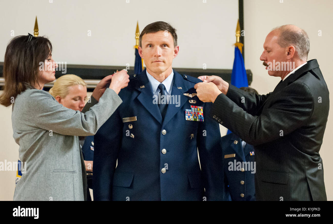 The wife and a family friend of Lt. Col. Jeffrey Wilkinson pin colonel ...