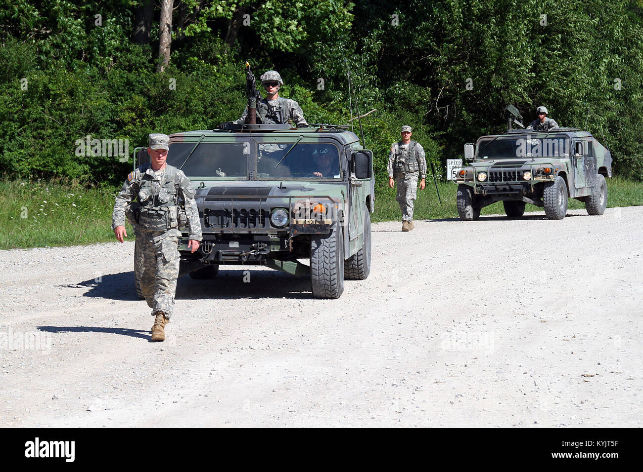 Soldiers of the 1st Battalion, 149th Infantry conduct convoy security ...