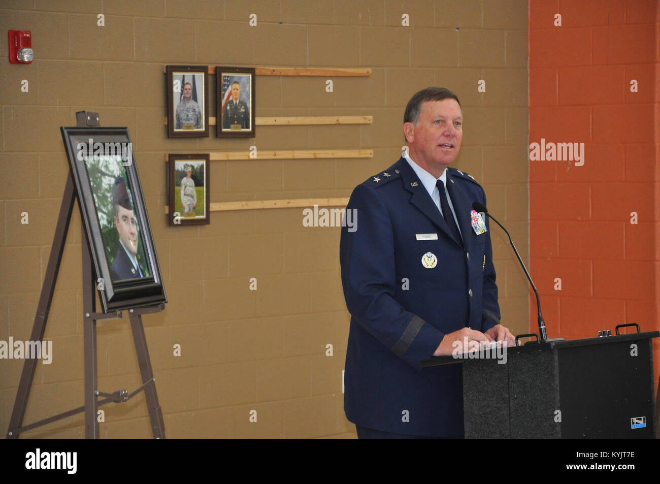 Maj. Gen. Edward W. Tonini speaks to attendees at the Ceremony to ...