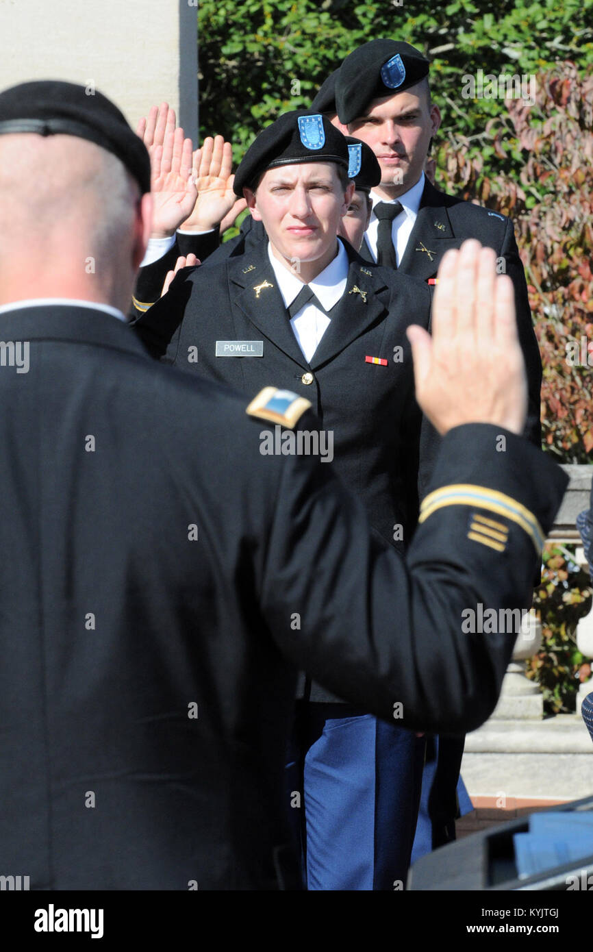 Second Lt. Sarah Powell is given the oath of office by Col. Hal ...