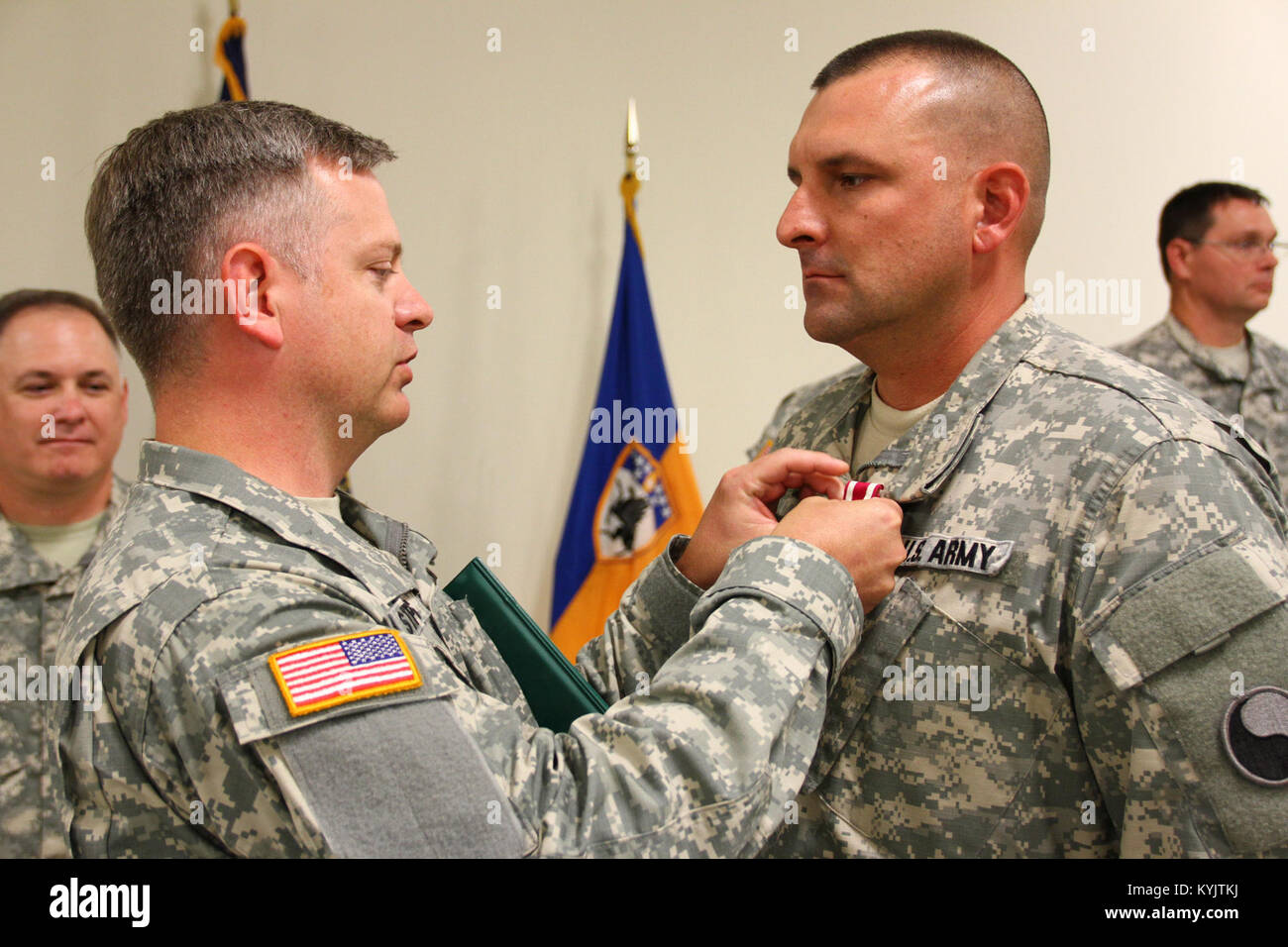 Lt. Col. Phillip D. Robinson receives the Meritorious Service Medal ...