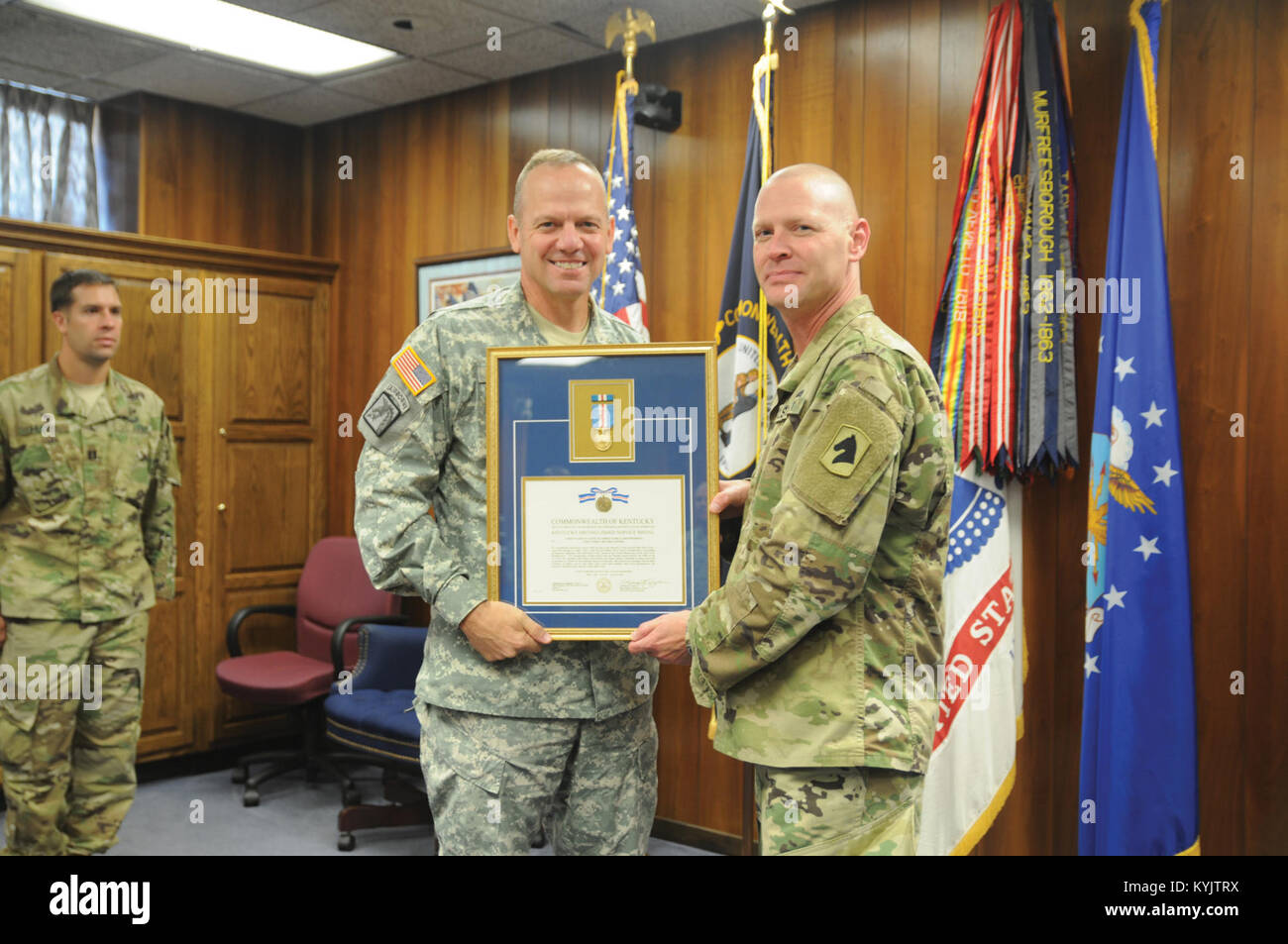 Chief Warrant Officer Todd B. Smothermon (right), human resources ...