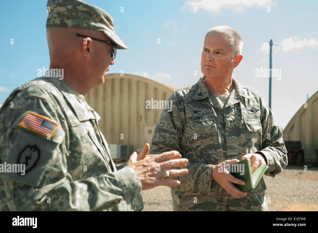 U.S. Army Brig. Gen. Frank W. Tate (left), deputy commanding general of ...