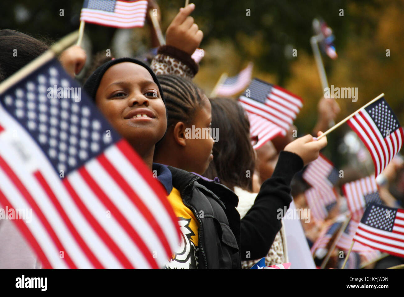 School children wave flags hi-res stock photography and images - Alamy