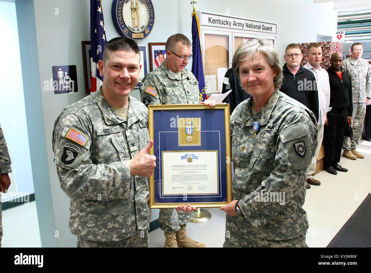 Col. Michael Abell presents Maj. Rosa Maynard with the Kentucky ...