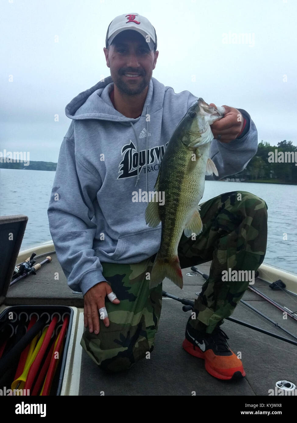 US military fishermn with fish caught Stock Photo - Alamy