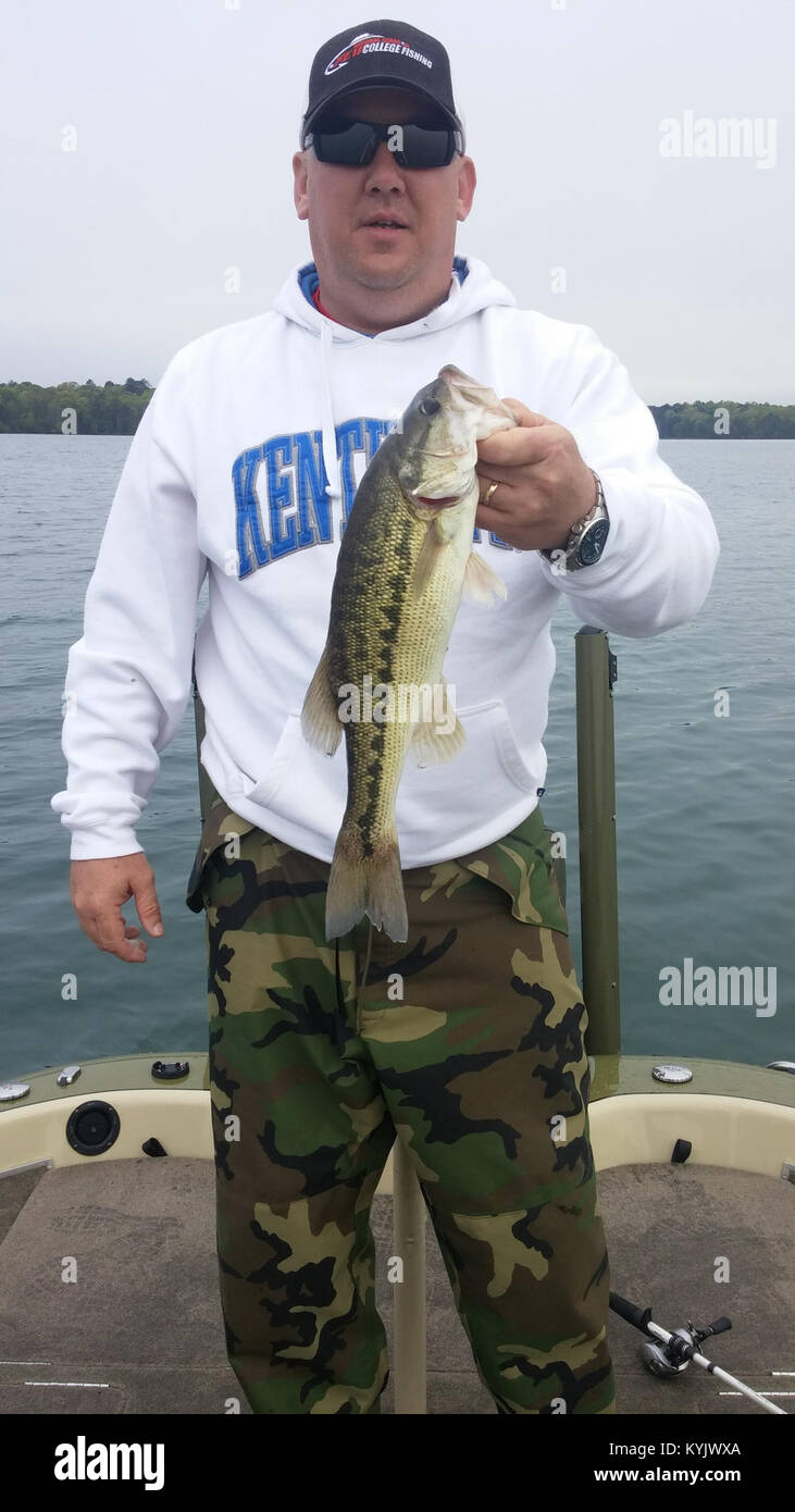 US military fishermn with fish caught Stock Photo - Alamy