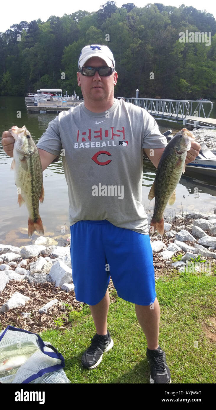 US military fishermn with fish caught Stock Photo - Alamy