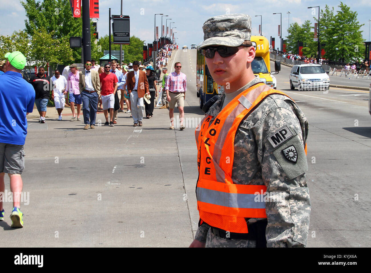 Pvt. Matthew Sturgill with the 198th Military Police Battalion assists ...