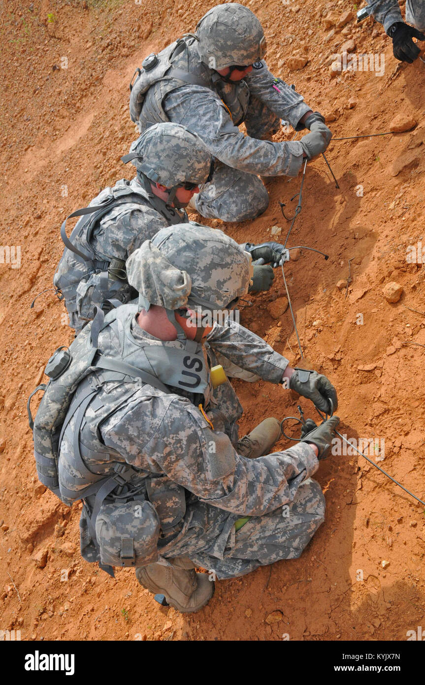 Soldiers of the 201st Engineer Battalion, 577th Sapper Company attach C ...