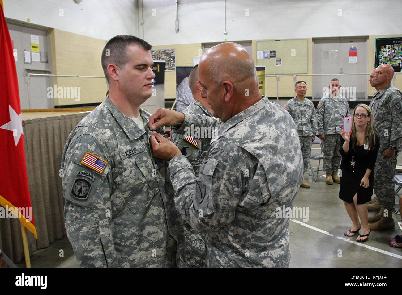 Sgt. Joshua Kemp receives the Kentucky Merit Ribbon during a birthday ...