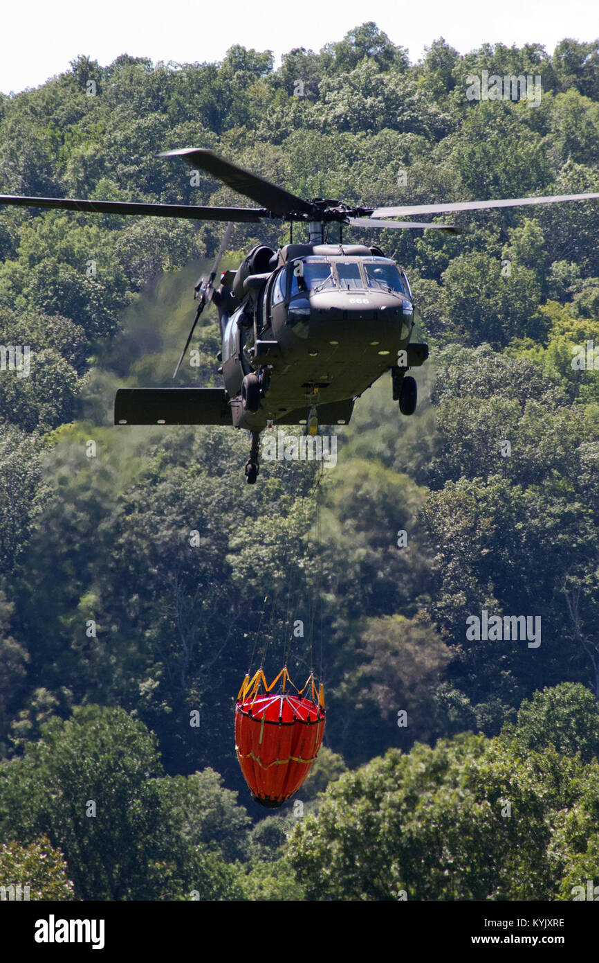 Soldiers with the 63rd Theater Aviation Brigade practice water drops ...