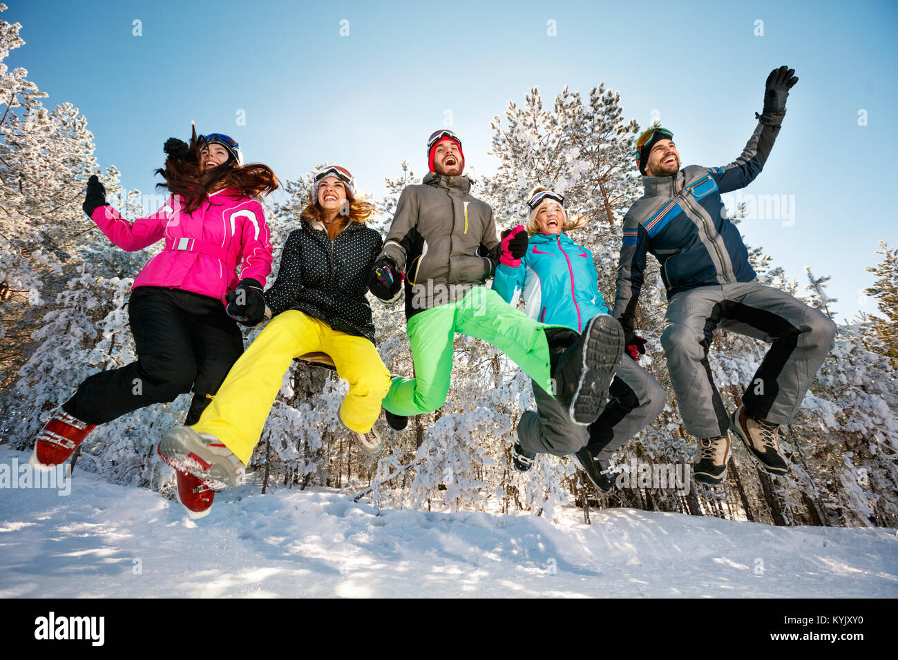 Women jumping snow hi-res stock photography and images - Alamy