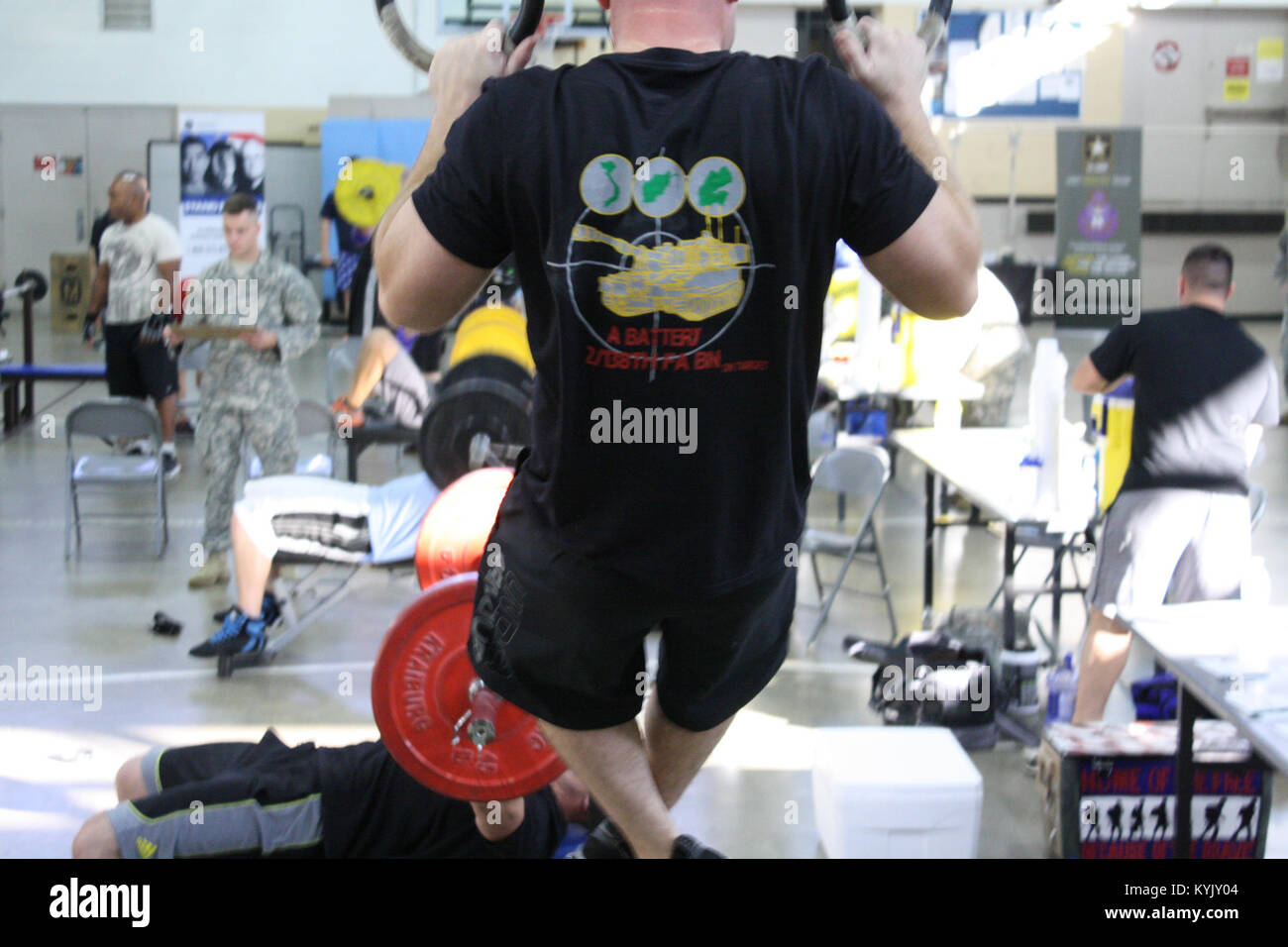 A Soldier from Alpha BTRY, 138th FA BDE does pull ups as part of the ...