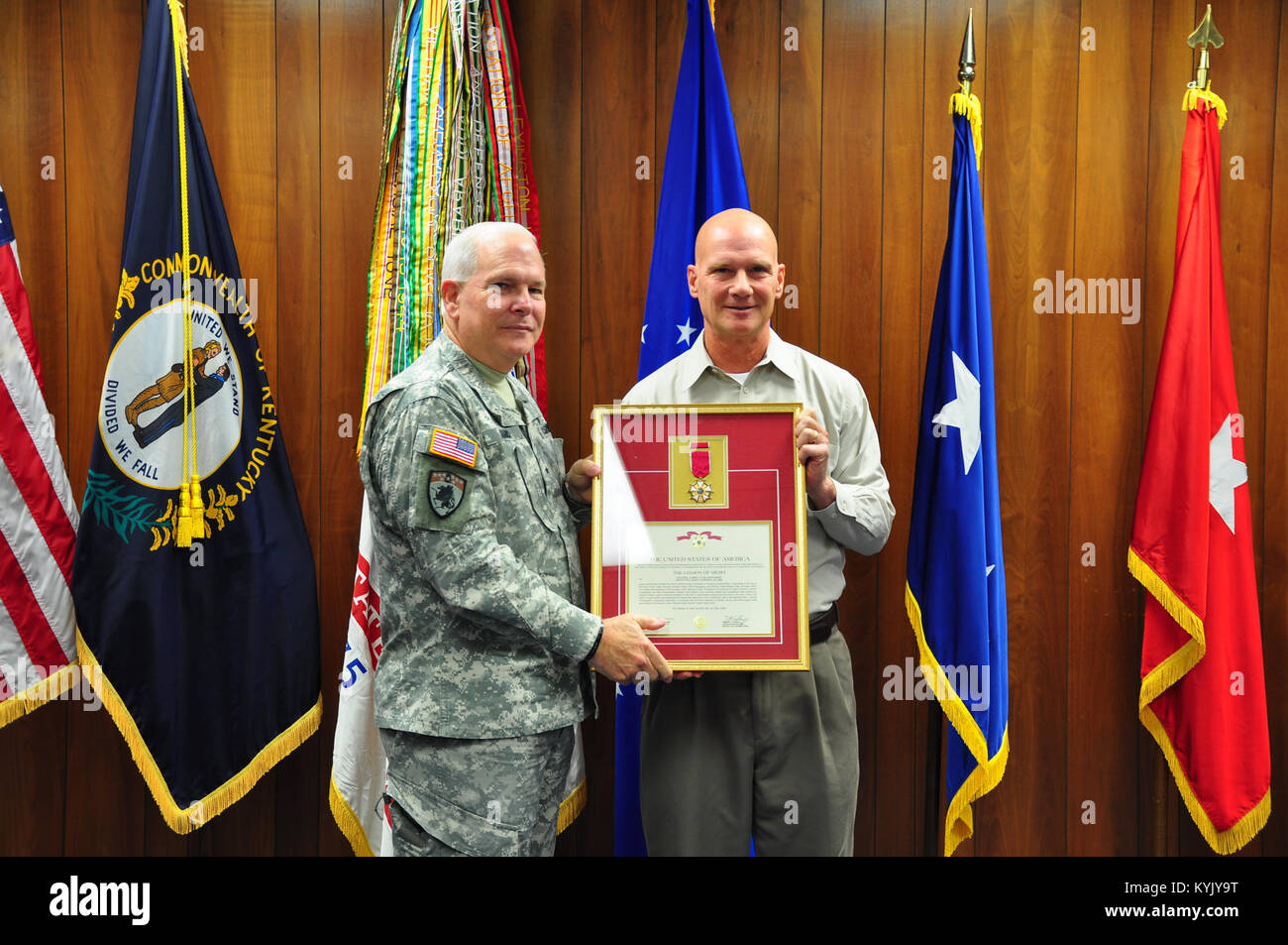 Brig. Gen. Ben Adams, Chief of the Joint Staff, presents a Legion of ...