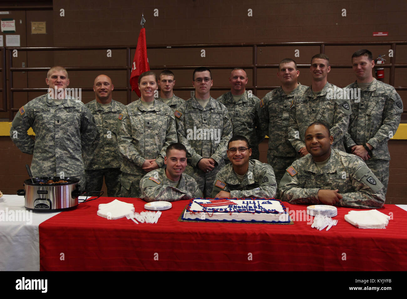 The 441st Survey & Design Team pose with a cake made in their honor at ...