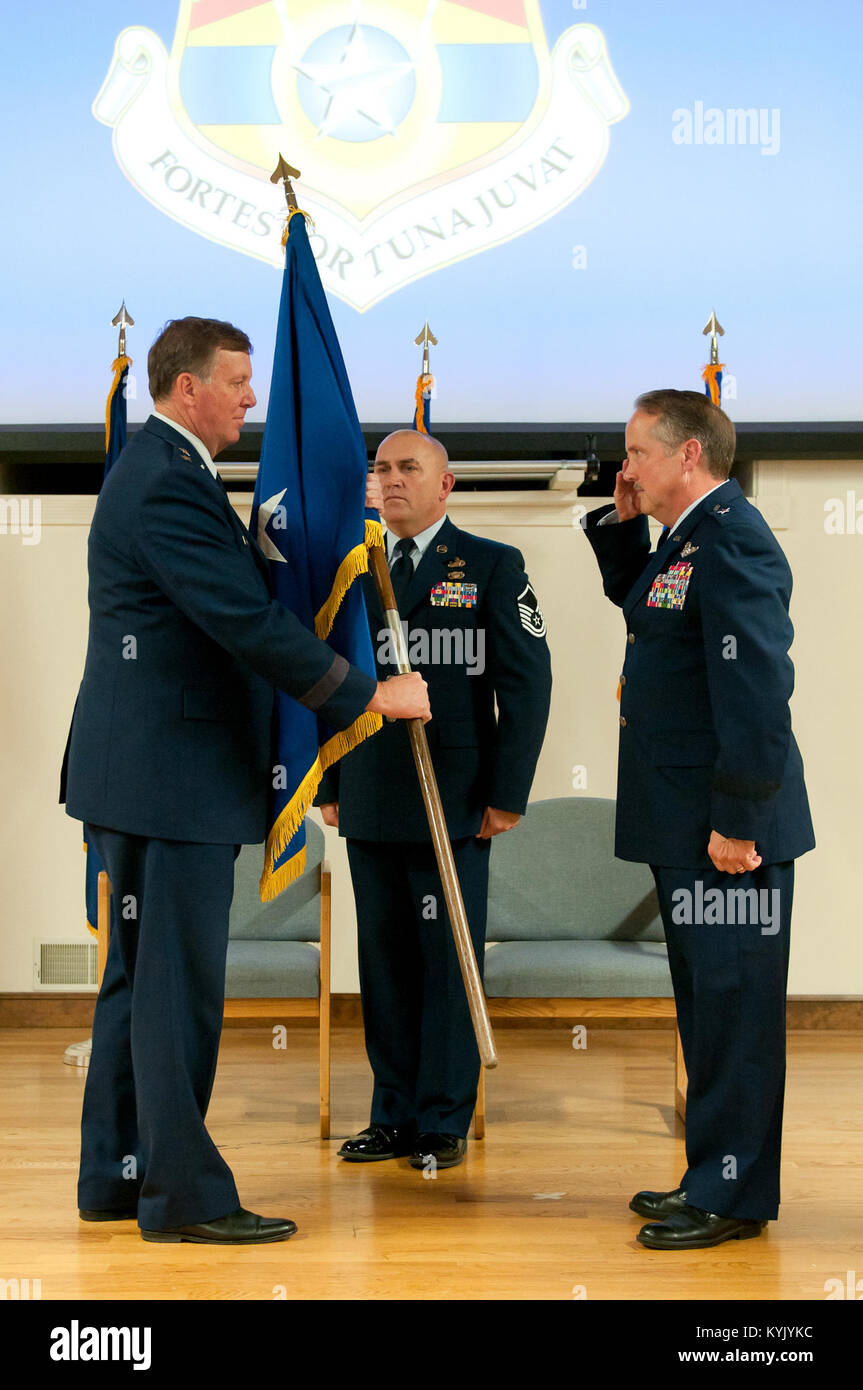 Brig. Gen. Gregory L. Nelson passes his general officer flag to ...