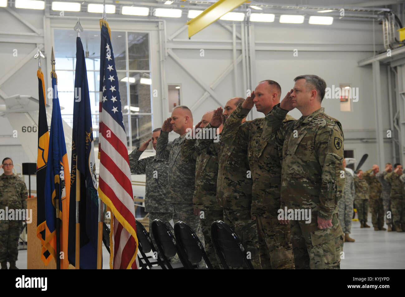 Members of the 63rd Theater Aviation Brigade's command staff salute ...